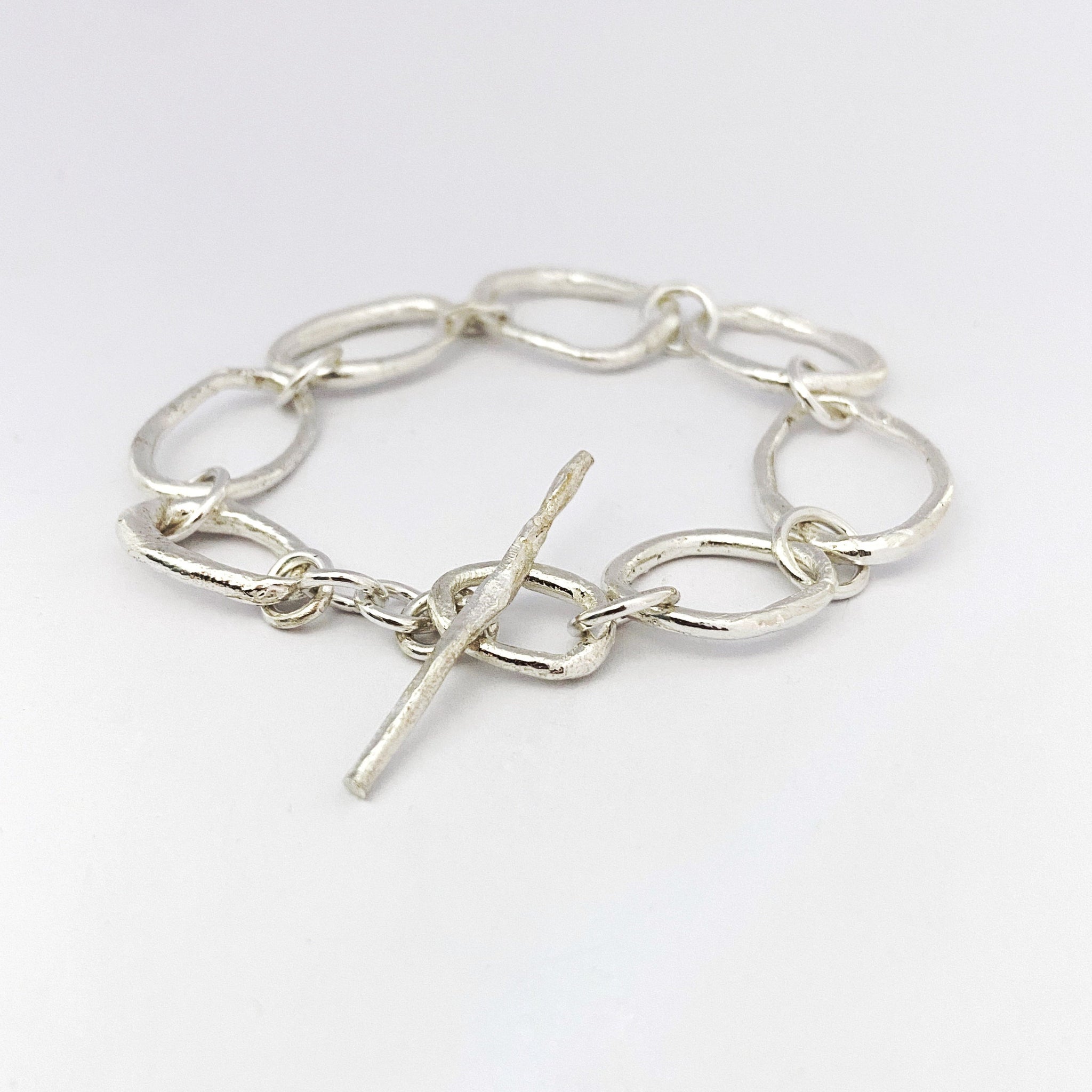 Organic oval bracelet in silver by Savage Jewellery